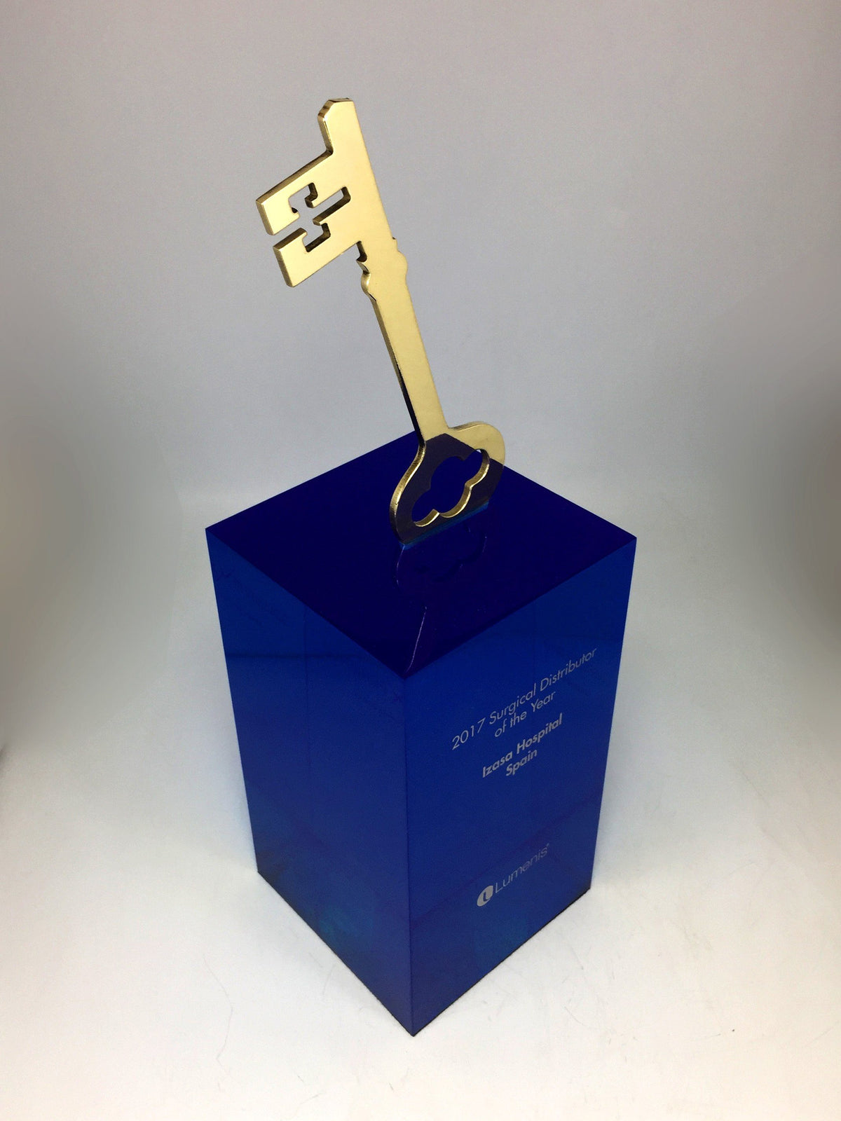 Gold Key on Blue Acrylic Base - Creative Awards London | Creative ...